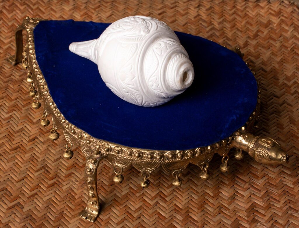 Conch Shell Engraved Mahadev With Dokra Stand - Biswa Bangla